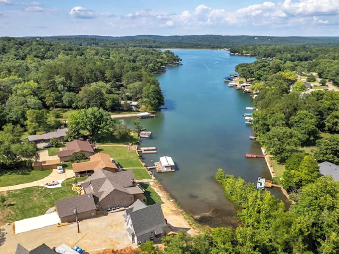 Morning mist over Cherokee Village waters whispers promises of peaceful retirement days ahead.