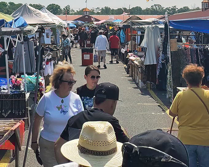 Shoppers navigate the bustling aisles of Columbus Flea Market. It's like a small city where the national currency is haggling and good finds.