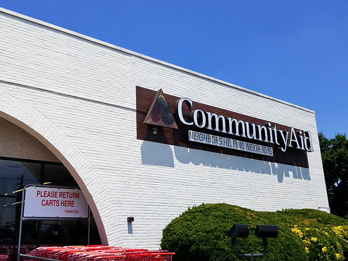 Community Aid's crisp white exterior stands like a beacon of thrift-shopping hope. Their "Neighbors Helping Neighbors" motto isn't just words&mdash;it's their mission in action.