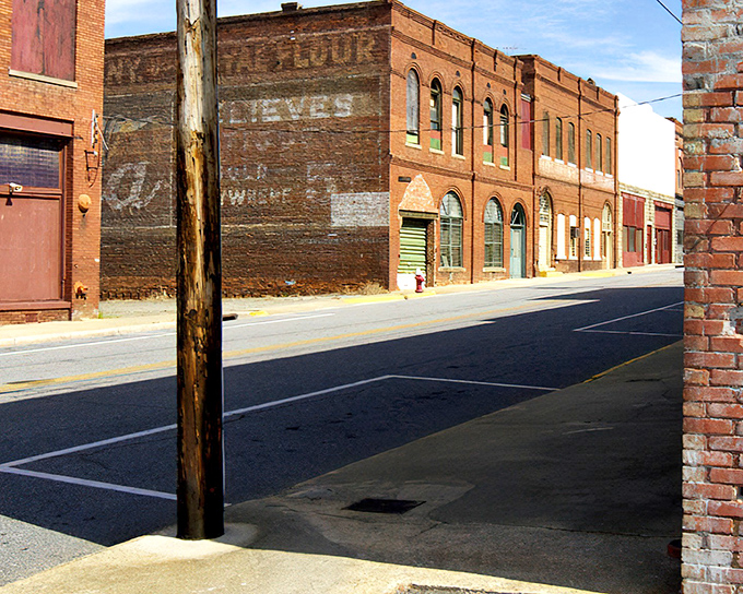 Faded ghost signs whisper tales of Cordele's past on weathered brick walls, a living museum on every street corner.