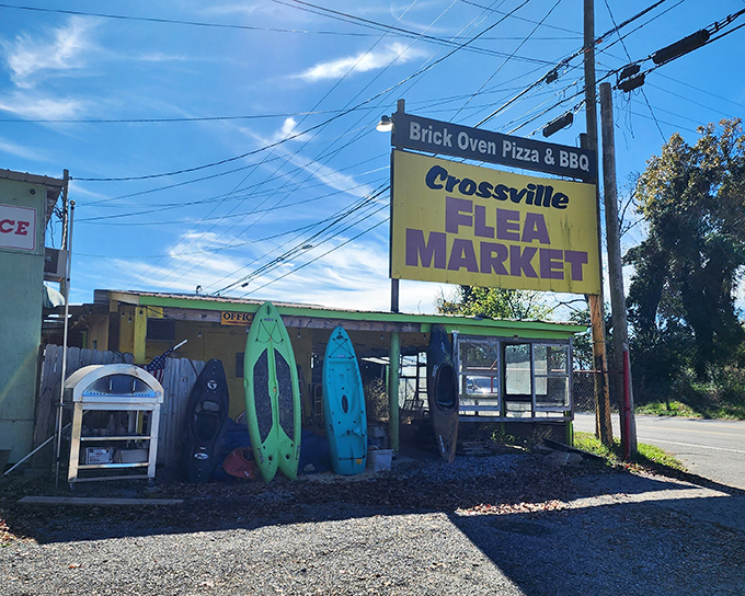 Colorful kayaks stand guard outside Crossville Flea Market &ndash; perhaps the most honest advertising ever: "Adventure sold here!"