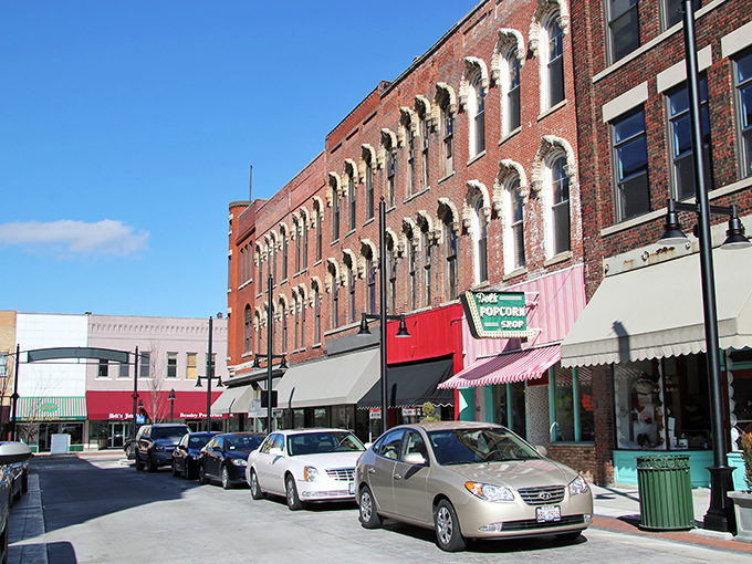 Historic brick buildings line Decatur's main street, where local shops and the famous popcorn store have served generations of residents.