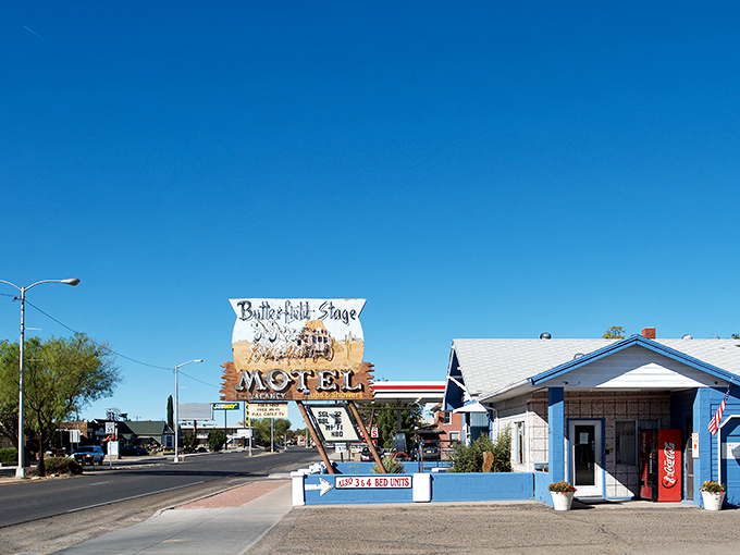 That classic motel sign beckons travelers with promises of comfort and affordable rest in the desert.