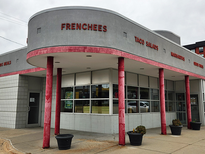 A closer look at Don & Millie's architectural charm. Those red pillars and "Frenchees" sign hint at the treasures waiting inside.