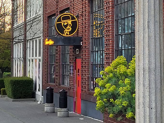 Red doors and exposed brick create the perfect backdrop for your next carnivorous adventure in Tacoma.