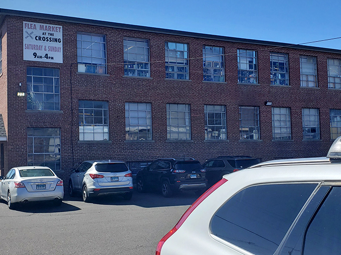 Weekend warriors gather where old factory walls now shelter bargain hunters instead of assembly lines—progress looks pretty good here.