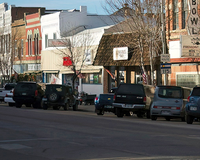 Florence's Main Street whispers stories of the Old West while trucks rumble by. Classic brick storefronts stand like sentinels of simpler times.