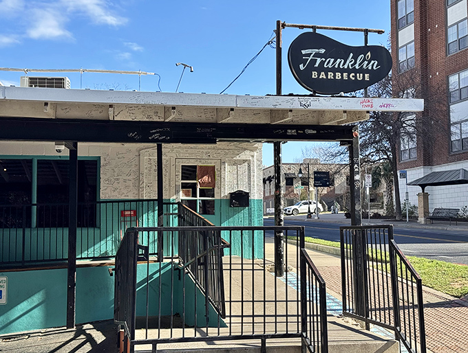 Franklin's iconic sign promises hours of waiting, but every smoky bite makes it worthwhile.