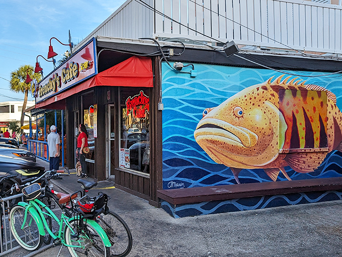 Red awnings and seaside charm create the perfect backdrop for Florida's finest grouper sandwich adventures.