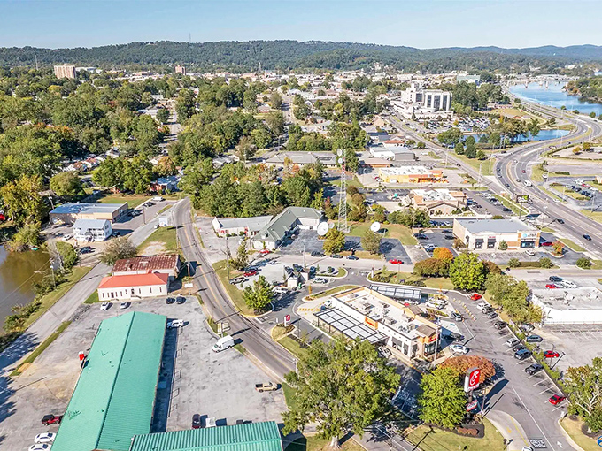 Gadsden's downtown spreads below like a Southern postcard, where retirement dreams meet riverside reality.