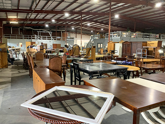 Rows of furniture stretching into the distance like a thrifter's version of heaven, all waiting for new homes.