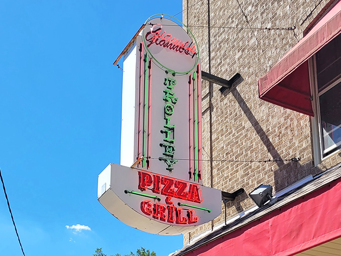 When the neon sign glows this bright, you know the pizza inside burns even brighter.