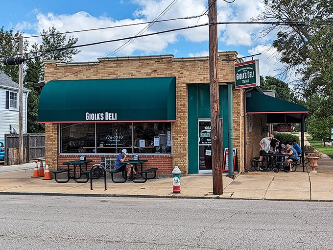 Sometimes the best treasures hide behind humble brick facades and weathered outdoor seating.