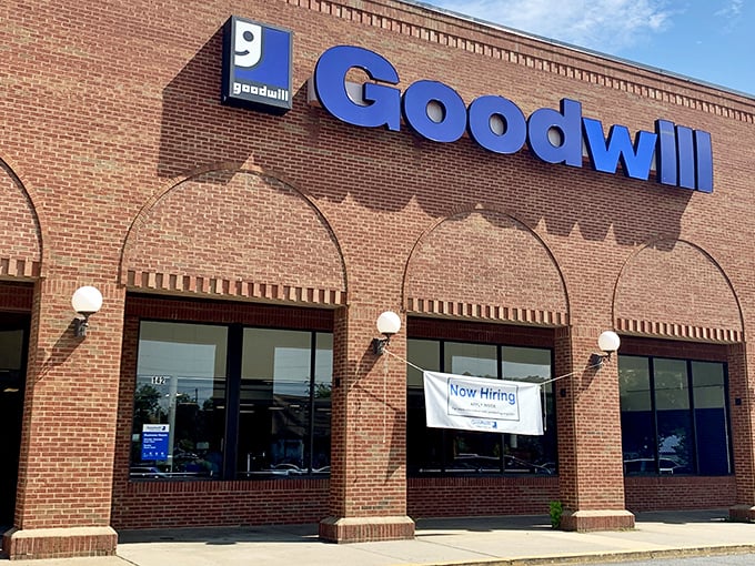 The "Now Hiring" sign means this treasure trove needs more people to help spread the thrift store magic.