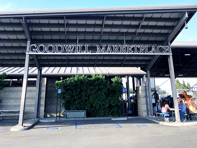 Goodwill's Santa Ana flagship stands ready for thrift adventurers. Under that industrial awning lies a wonderland where one person's castoffs become another's treasures.