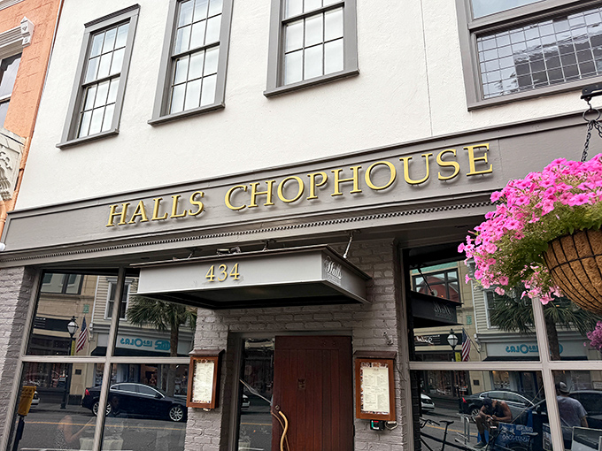 That golden glow isn't just the lighting &ndash; it's the promise of perfectly aged beef waiting inside this Charleston institution.