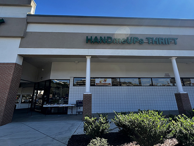 HandmeUPs Thrift's clean exterior promises an organized shopping adventure inside. No Indiana Jones machete needed to navigate these well-arranged aisles!