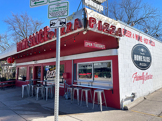 The classic red and white exterior of Home Slice screams "authentic New York slice" before you even walk through the door.