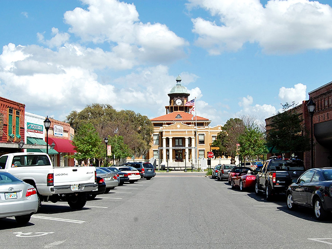 Inverness's courthouse square looks like it jumped straight out of a Norman Rockwell painting. Those angled parking spots are pure small-town perfection.