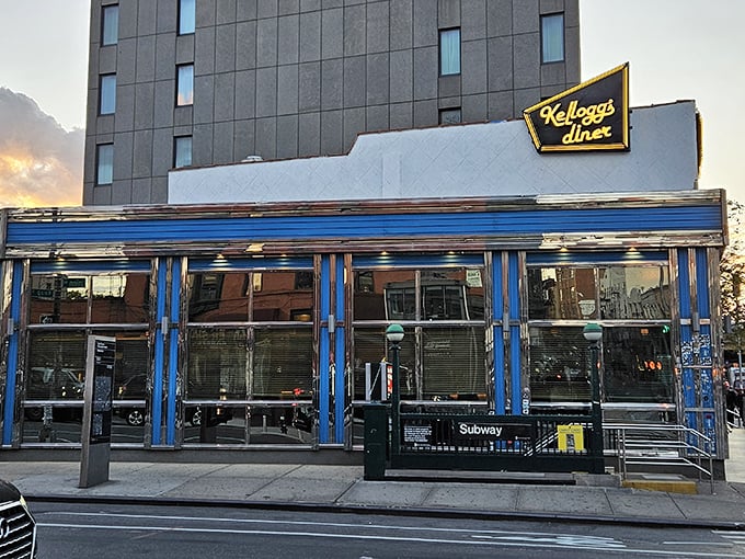 Step into Kellogg's Diner where the neon sign glows like a beacon for hungry souls.