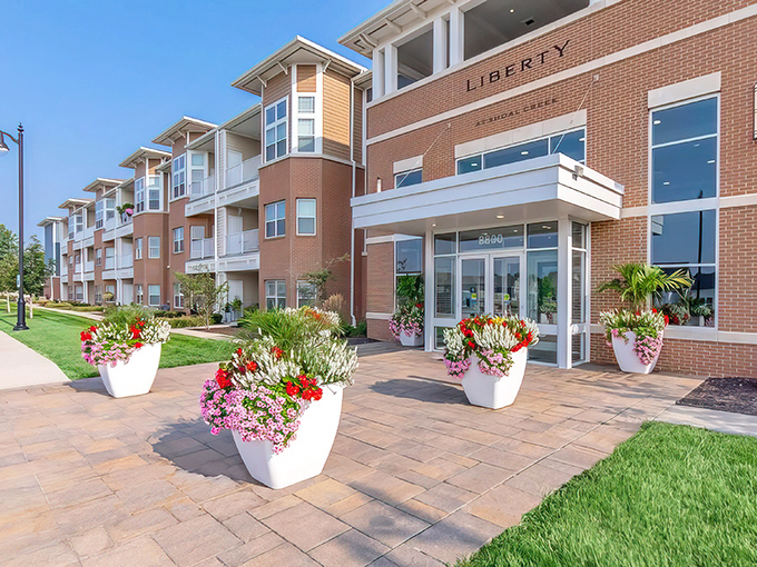 Sunshine highlights Liberty's thoughtful design &ndash; those white planters aren't just pretty, they're saying "Welcome home!"