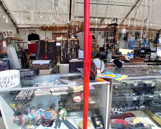 Jewelry heaven awaits! Glass cases sparkle with potential heirlooms while "Cash for Gold" signs remind us of the treasures hiding in plain sight.