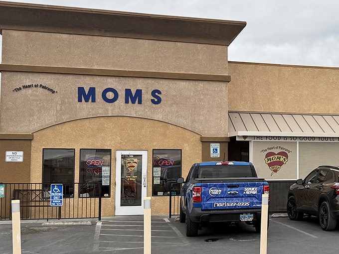 Desert sunshine bathes Mom's Diner in golden light, where locals gather for coffee that never stops flowing and pancakes bigger than your plans.