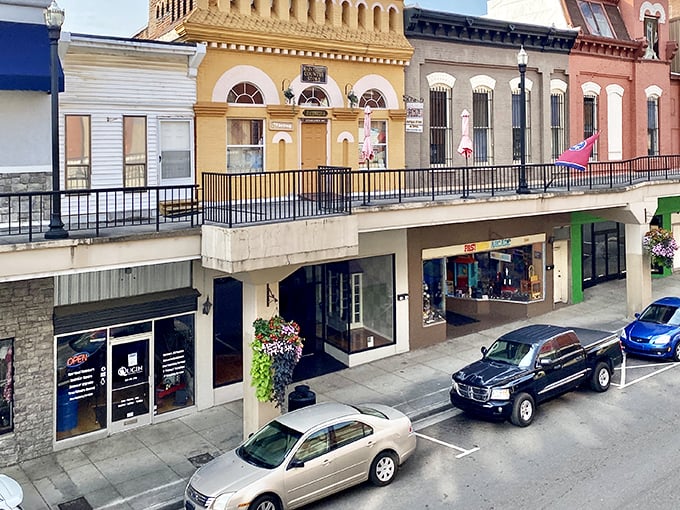 Historic downtown buildings stand shoulder-to-shoulder, whispering stories of simpler times and sweeter deals.