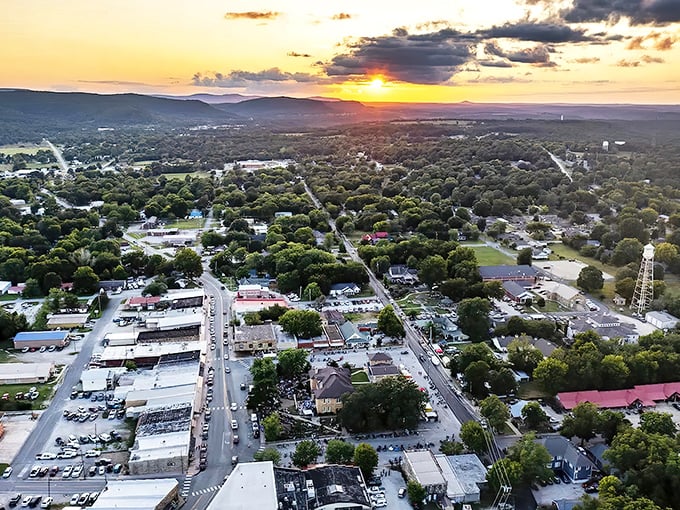 Sunset paints the Ozark Mountains gold as Mountain View nestles among the trees&mdash;a postcard-perfect scene that costs far less than you'd expect.