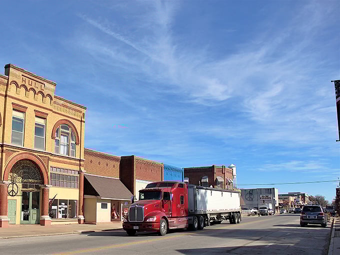 Blue skies frame Neodesha's classic storefronts, offering a retirement backdrop where your mailbox won't fill with parking tickets or outrageous bills.