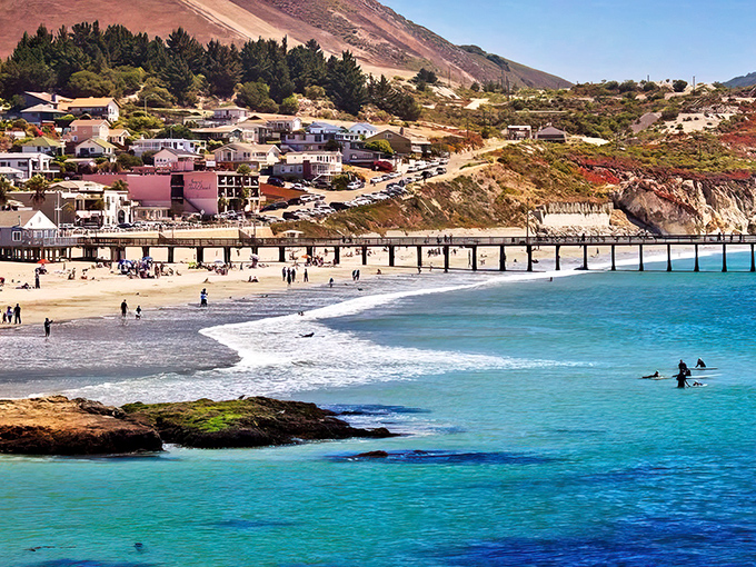 That turquoise water against golden sand makes Oceano look like a postcard you can actually afford to live in.