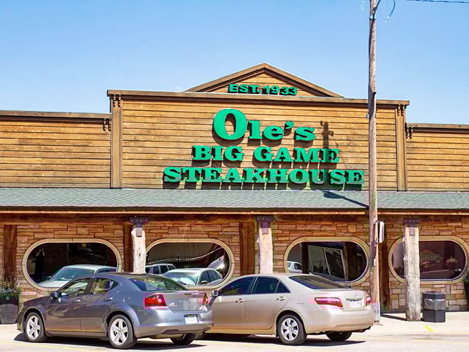 Wood-paneled walls and trophy heads create the ultimate hunter's paradise dining experience.