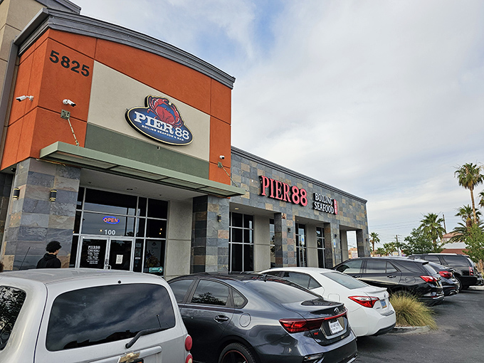 The bright red Pier 88 sign beckons seafood lovers like a lighthouse guiding hungry sailors to shore.
