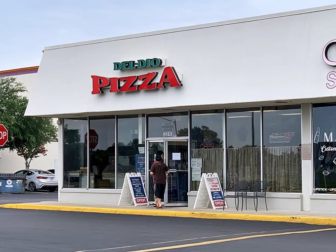 Del-Dio's bright red sign beckons pizza lovers like a lighthouse for the hungry. This Orlando gem has been satisfying cravings for years.