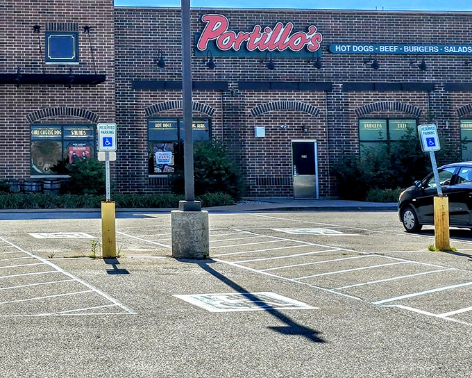 That iconic red Portillo's sign beckons hungry Hoosiers like a beacon of hot dog heaven.