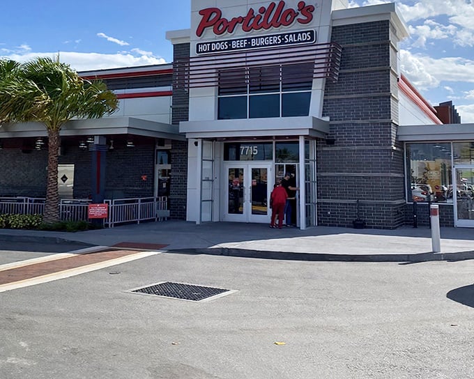 The palm tree might say "Florida," but that red Portillo's sign whispers "Chicago dog paradise awaits inside."