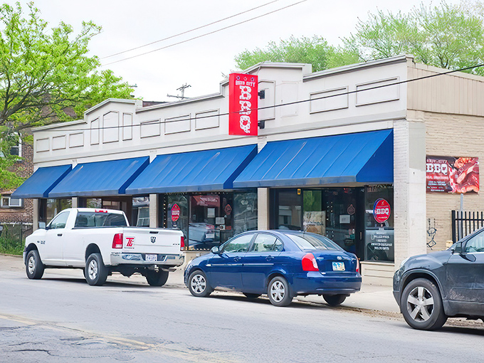 Real Smoq'ed BBQ's modest exterior belies the flavor explosion waiting within. That BBQ sign promises smoky delights for the hungry explorer.