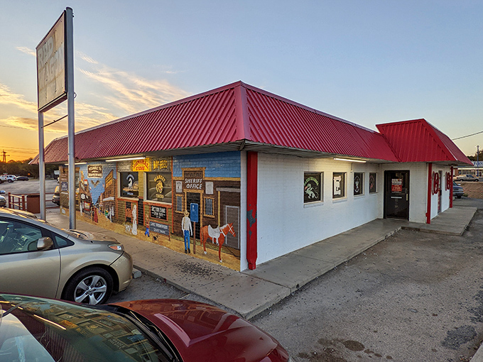 Sunset casts a golden glow on this Brownwood institution, where the red roof has welcomed hungry travelers for generations.