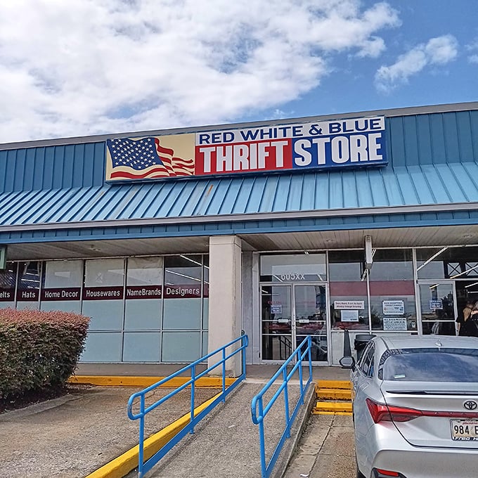 The iconic blue-roofed storefront of Red White & Blue Thrift Store, where bargain adventures begin with a patriotic flair.