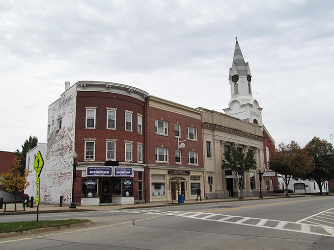 Downtown Rochester's historic brick buildings stand tall against the sky. That white church steeple is practically begging for a postcard moment.