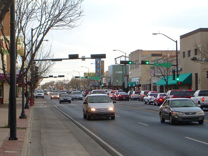Roswell's Main Street comes alive at dusk, with local businesses offering budget-friendly shopping and dining experiences beneath the New Mexico sky.