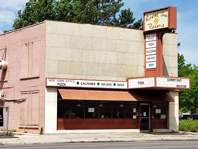 Don't judge this book by its cover - behind that modest facade lies serious pizza magic.