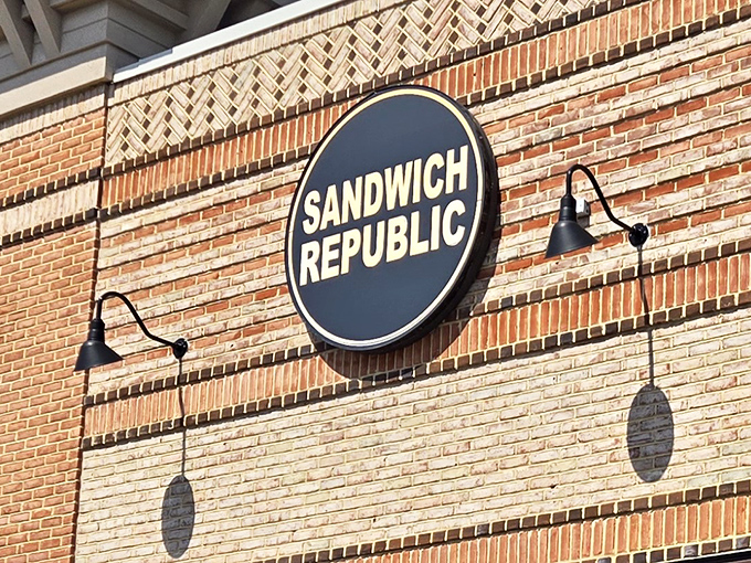 That circular blue sign isn't just decoration - it's a beacon of hope for the sandwich-obsessed seeking their next great bite.