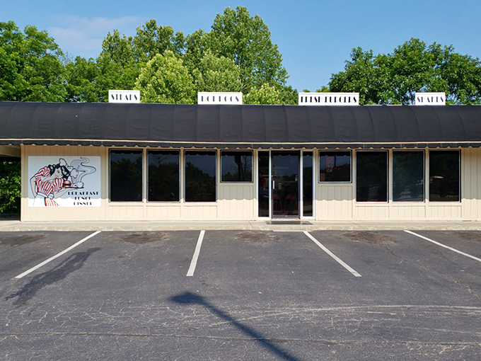 Small-town charm meets big-time flavor at this Etowah institution where every burger tells a delicious story.