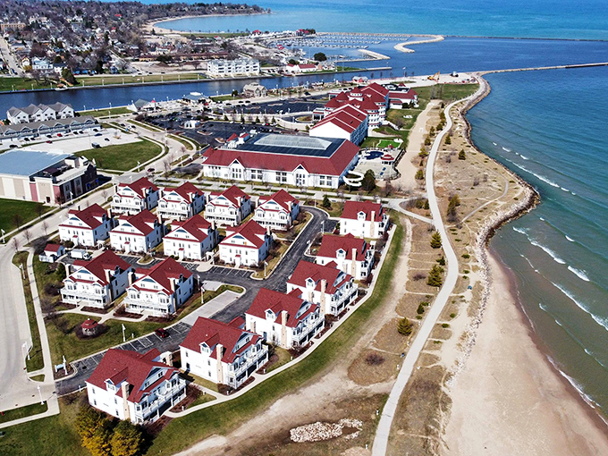 Those red-roofed buildings aren't just pretty - they're your gateway to Lake Michigan's endless blue horizon.