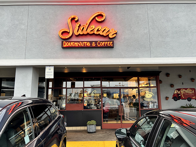 Sidecar's glowing sign promises donut nirvana. Like finding the Holy Grail of fried dough in a strip mall.