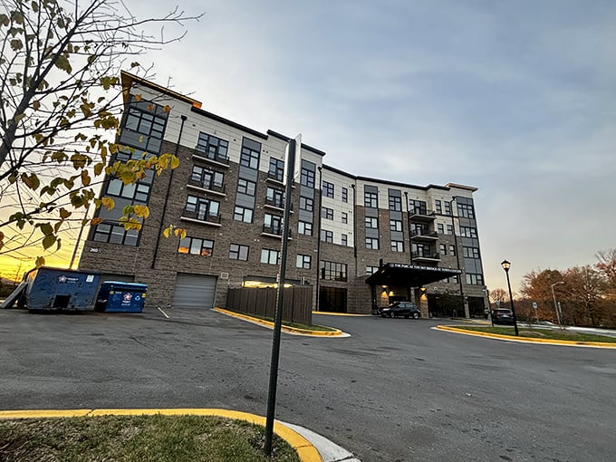 Modern brick meets cozy comfort at Sky Bridge. The sunset glow on those windows promises warm evenings and peaceful nights ahead.