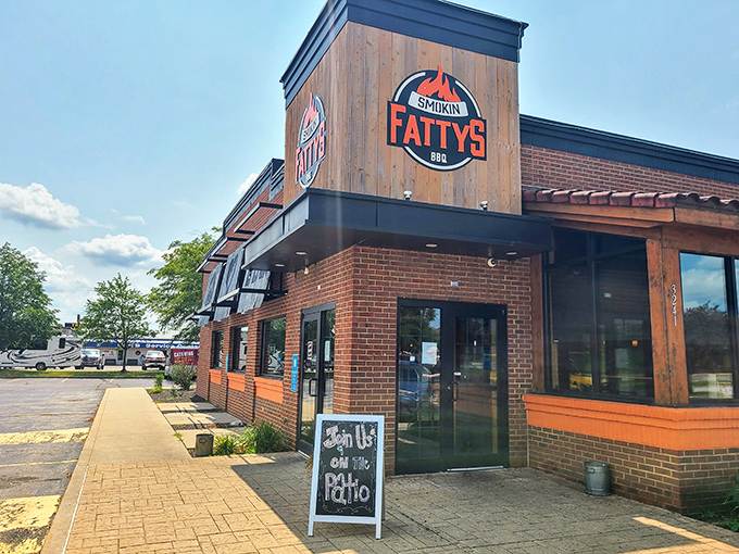 "Join us on the patio!" The chalkboard invites, while that Smokin Fattys sign silently guarantees meat worth writing home about.