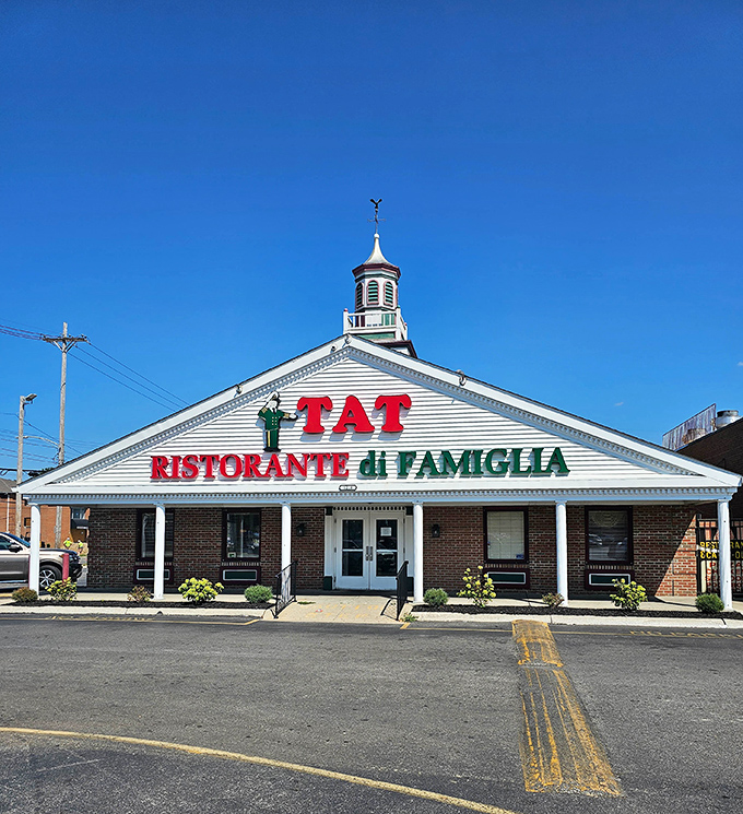 That bold red and green signage isn't just for show&mdash;it's a promise of family recipes that'll make your taste buds dance.