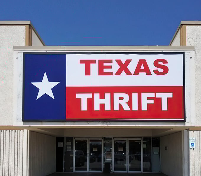 Texas pride meets thrift store paradise. That red, white, and blue sign promises a shopping adventure as big as the Lone Star state itself.